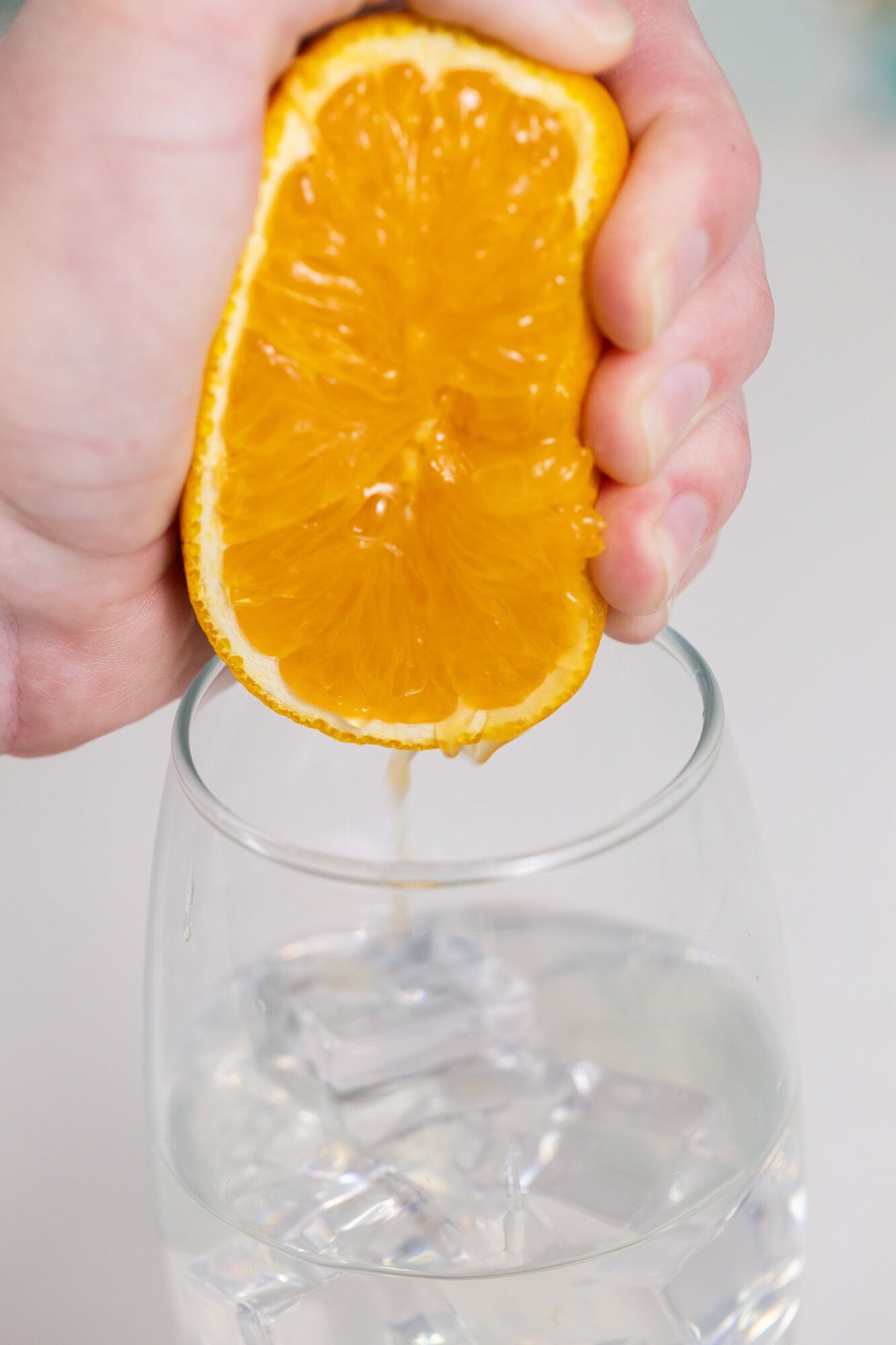 Coconut Water Americano with Ice and an Orange Twist! - Mind Over Munch